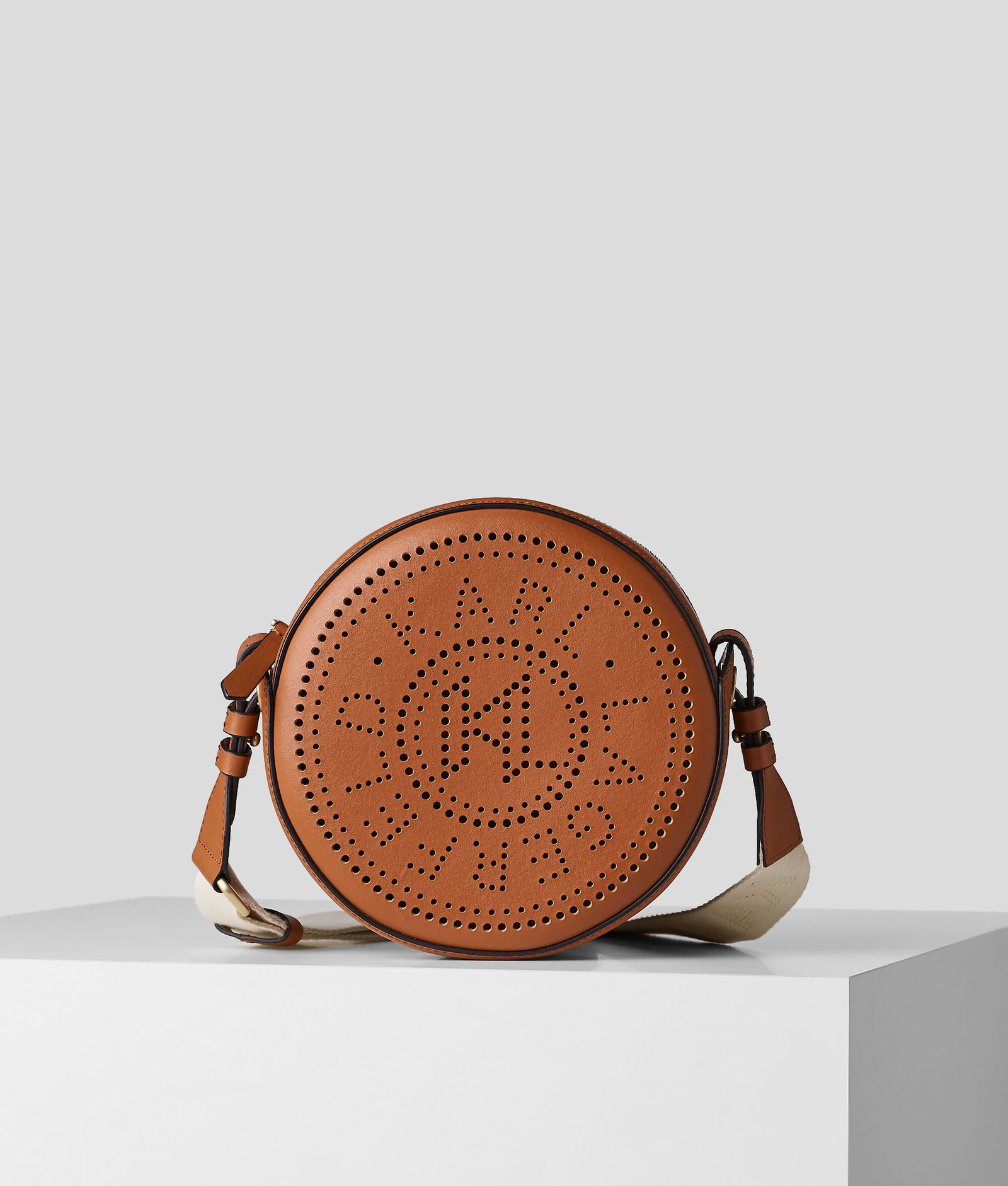 KARL LAGERFELD K/Circle Round Perforated Logo Bag in Brown | endource