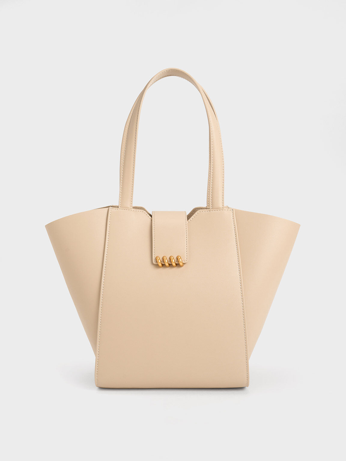 CHARLES & KEITH Osiris Metallic Accent Trapeze Tote in Beige | Endource