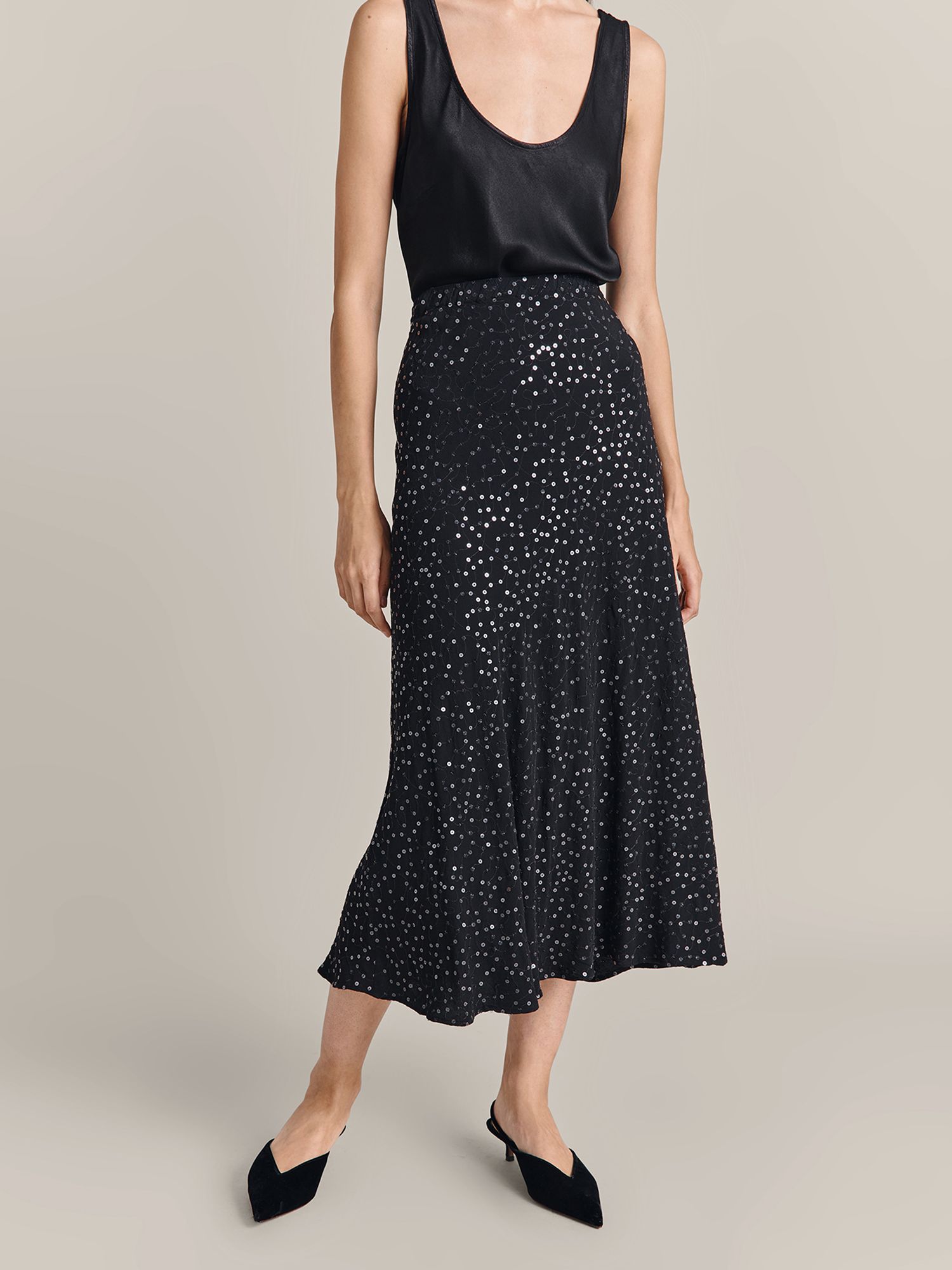 GHOST Eva Sequin Midi Skirt in Black | Endource