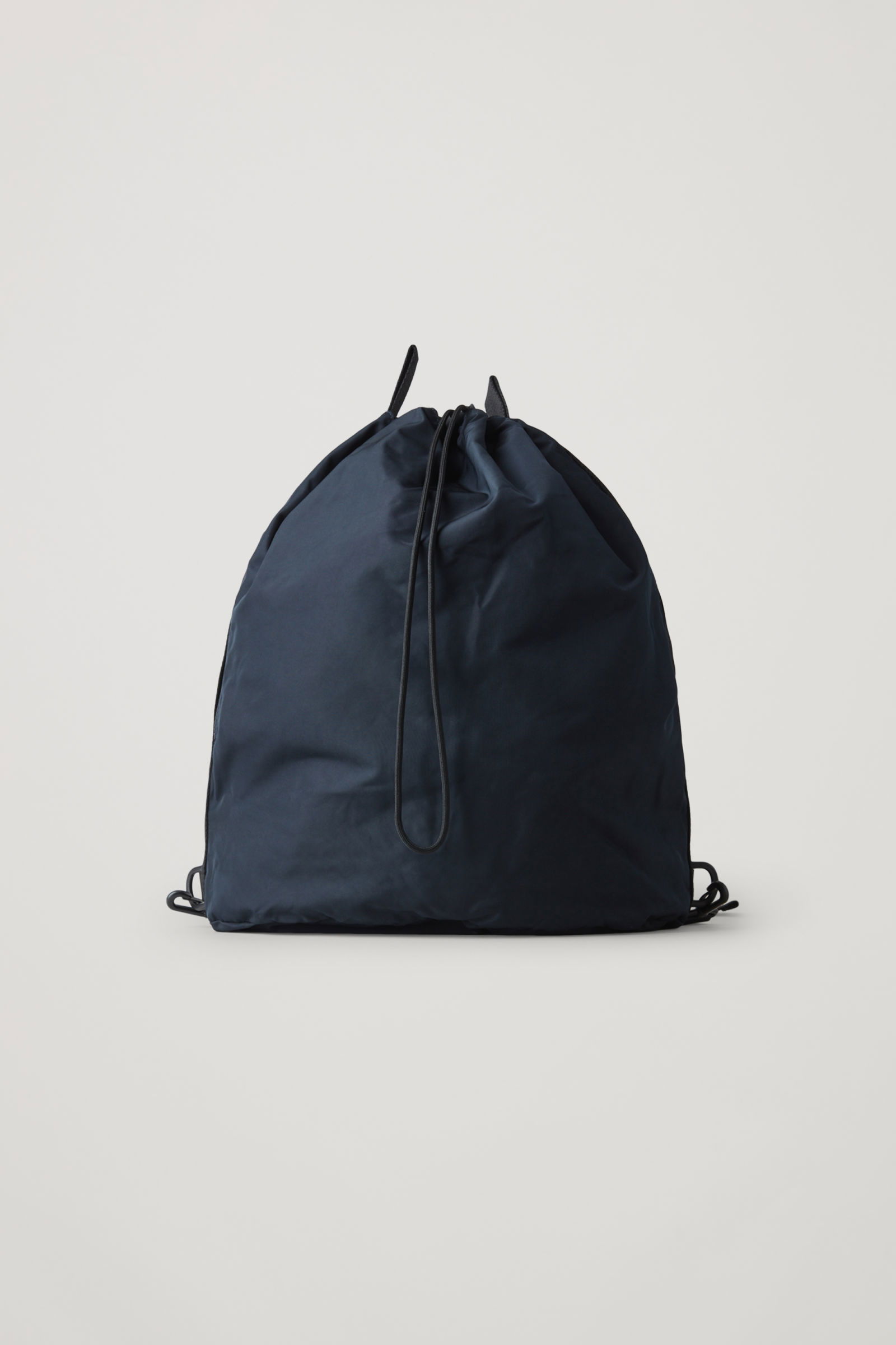 COS Drawstring Nylon Backpack in navy | endource