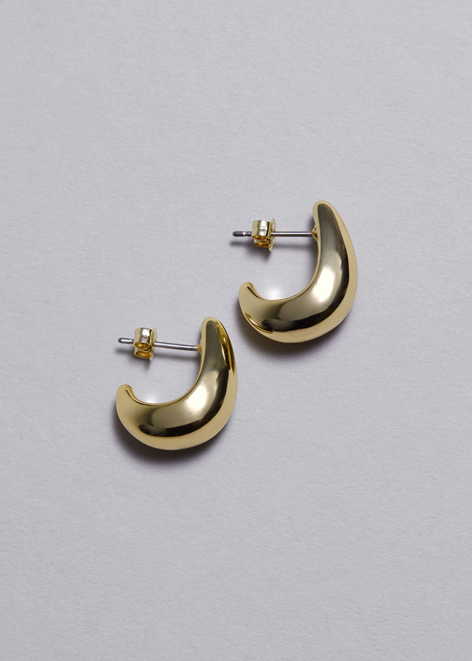 & OTHER STORIES Curved Earrings in Gold | endource