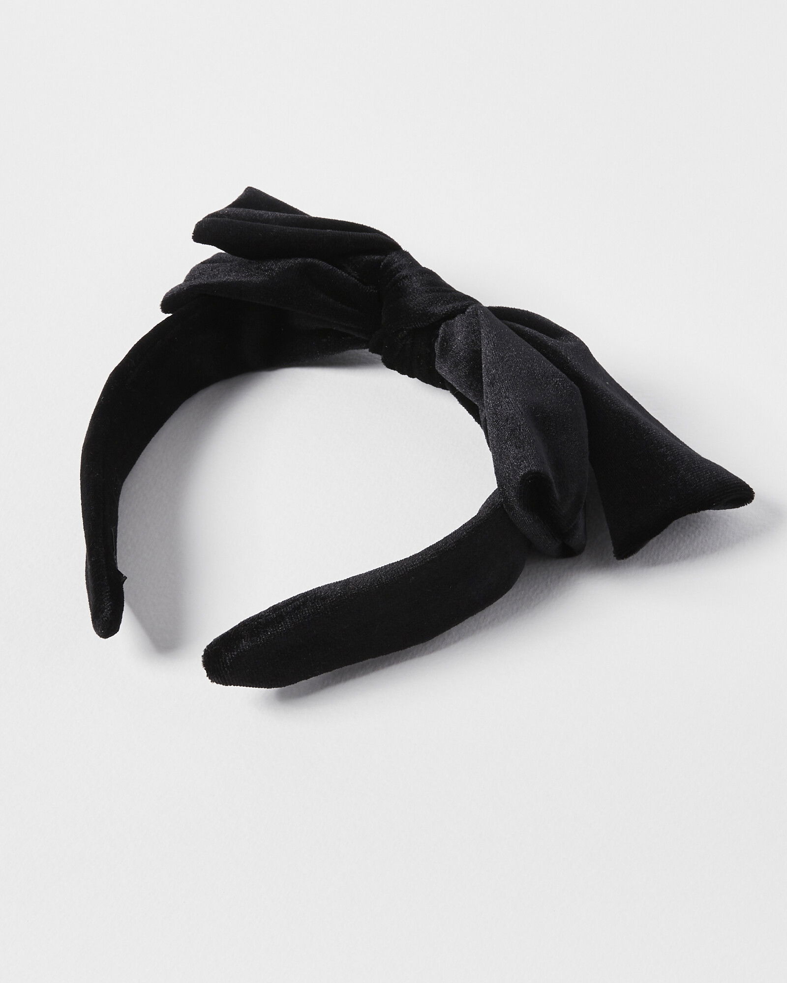 OLIVER BONAS Gabrielle Velvet Statement Bow Headband in Black | Endource