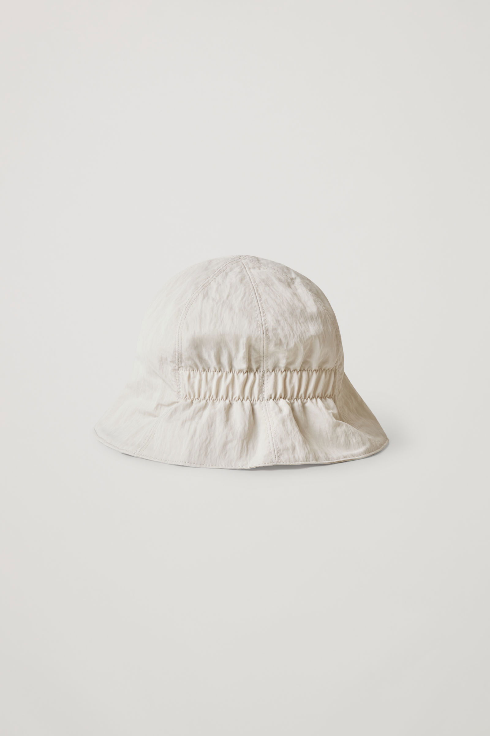 COS Ruched Bucket Hat in beige | endource