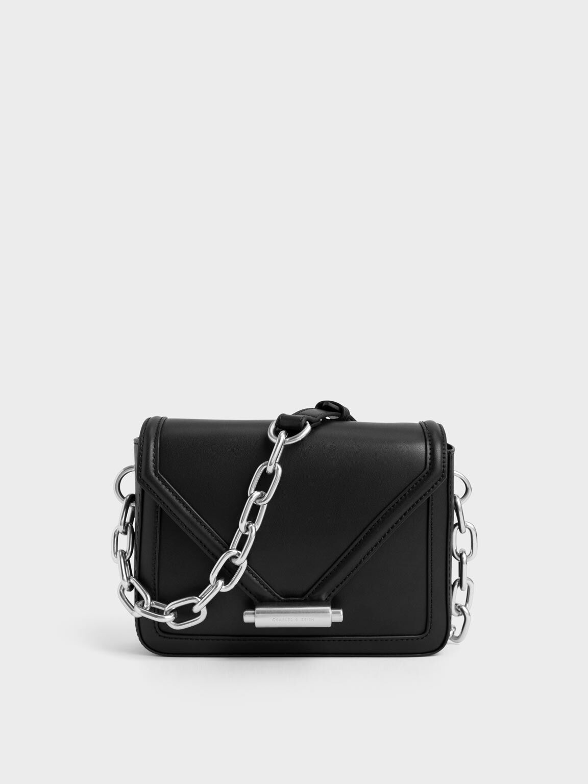 CHARLES & KEITH Lola Envelope Crossbody Bag in Black | endource