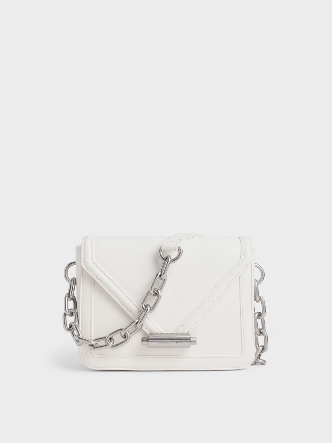 CHARLES & KEITH Lola Envelope Crossbody Bag in White | endource