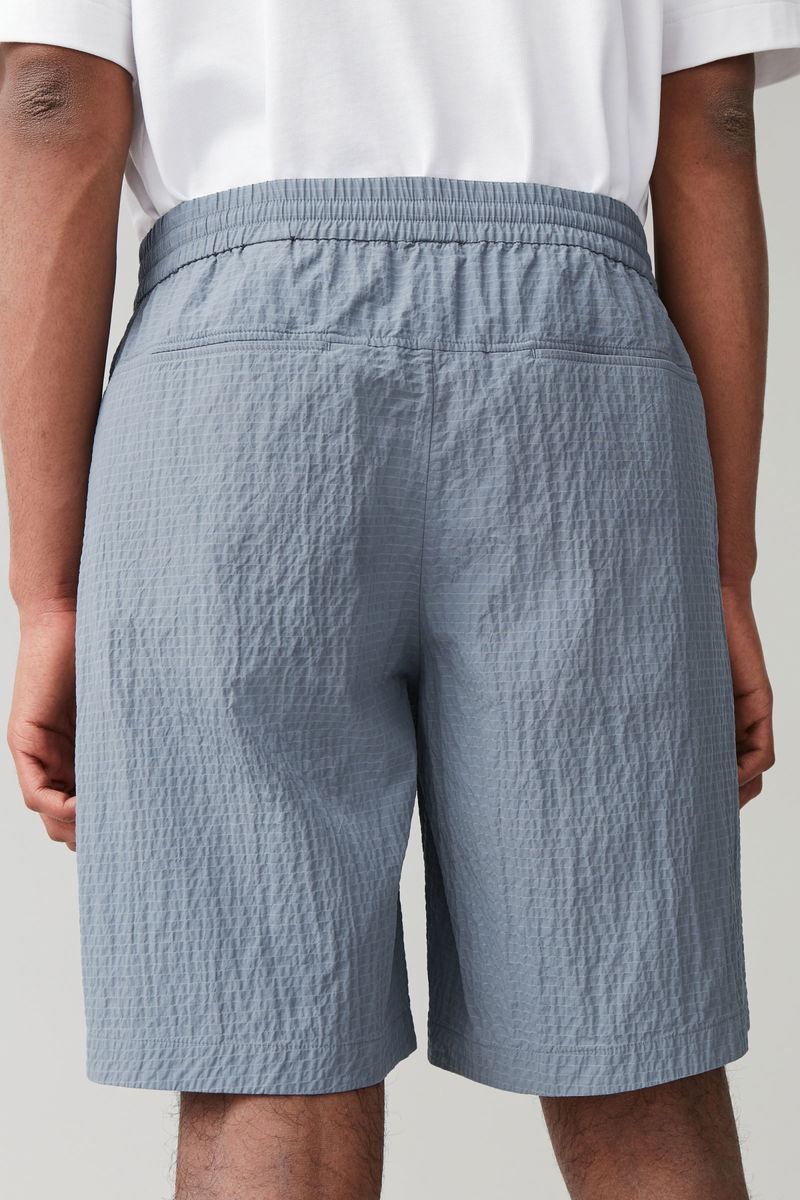 COS Seersucker Cotton Shorts in steel blue | Endource
