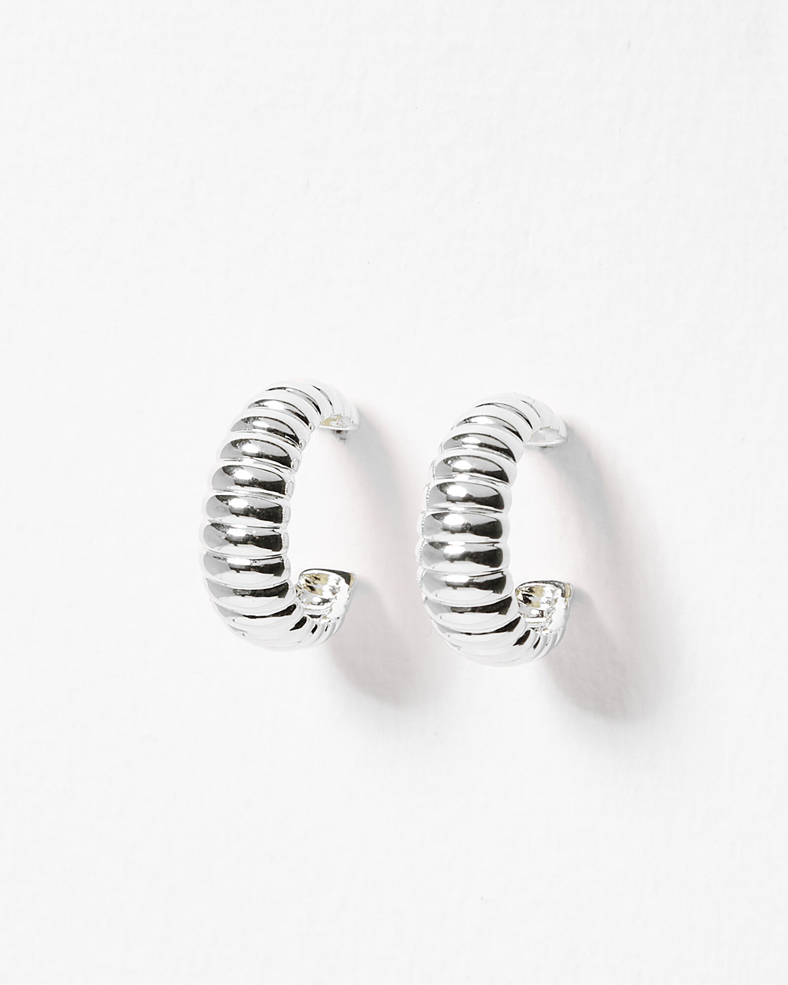 OLIVER BONAS Aleena Ribbed Texture Statement Silver Hoop Earrings in Silver | endource