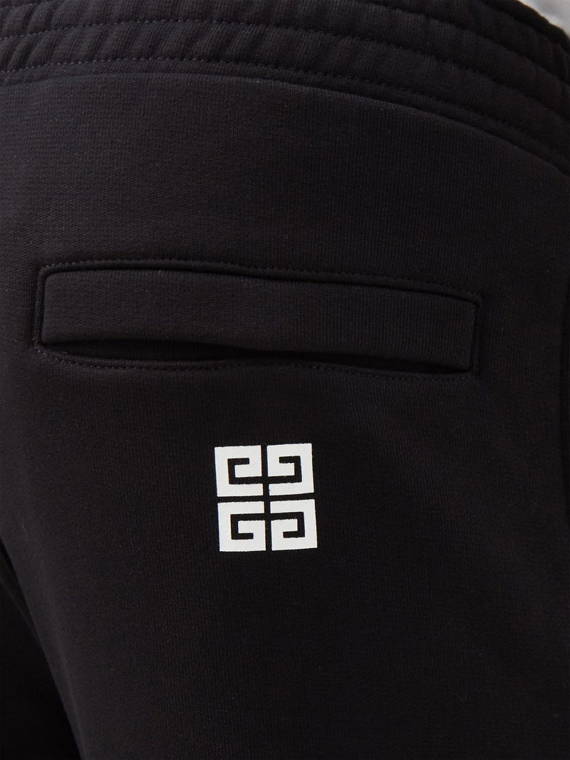 GIVENCHY Logo-Print Cotton-Jersey Track Pants in Black | endource
