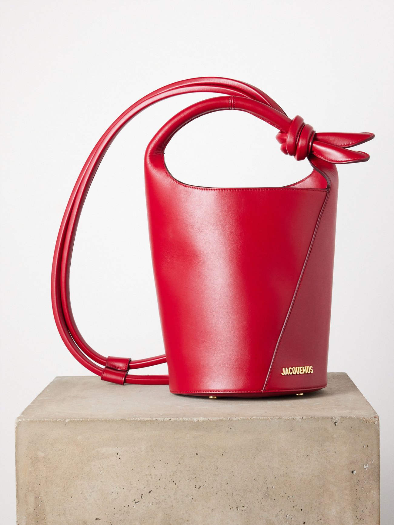 JACQUEMUS Tourni Small Leather Bucket Bag in Red | Endource