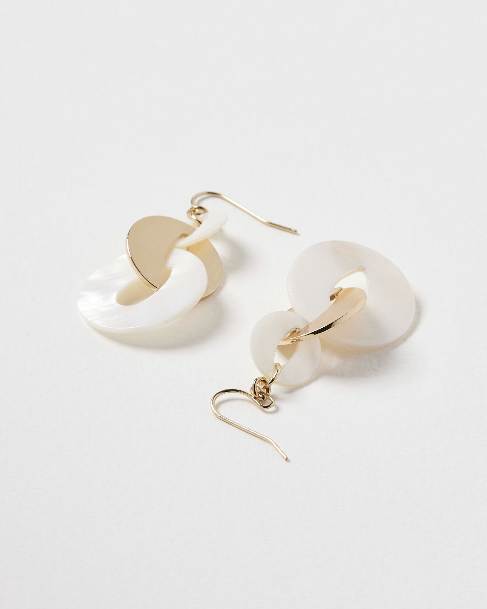 OLIVER BONAS Evie Interlinked Disc Drop Earrings in White | endource