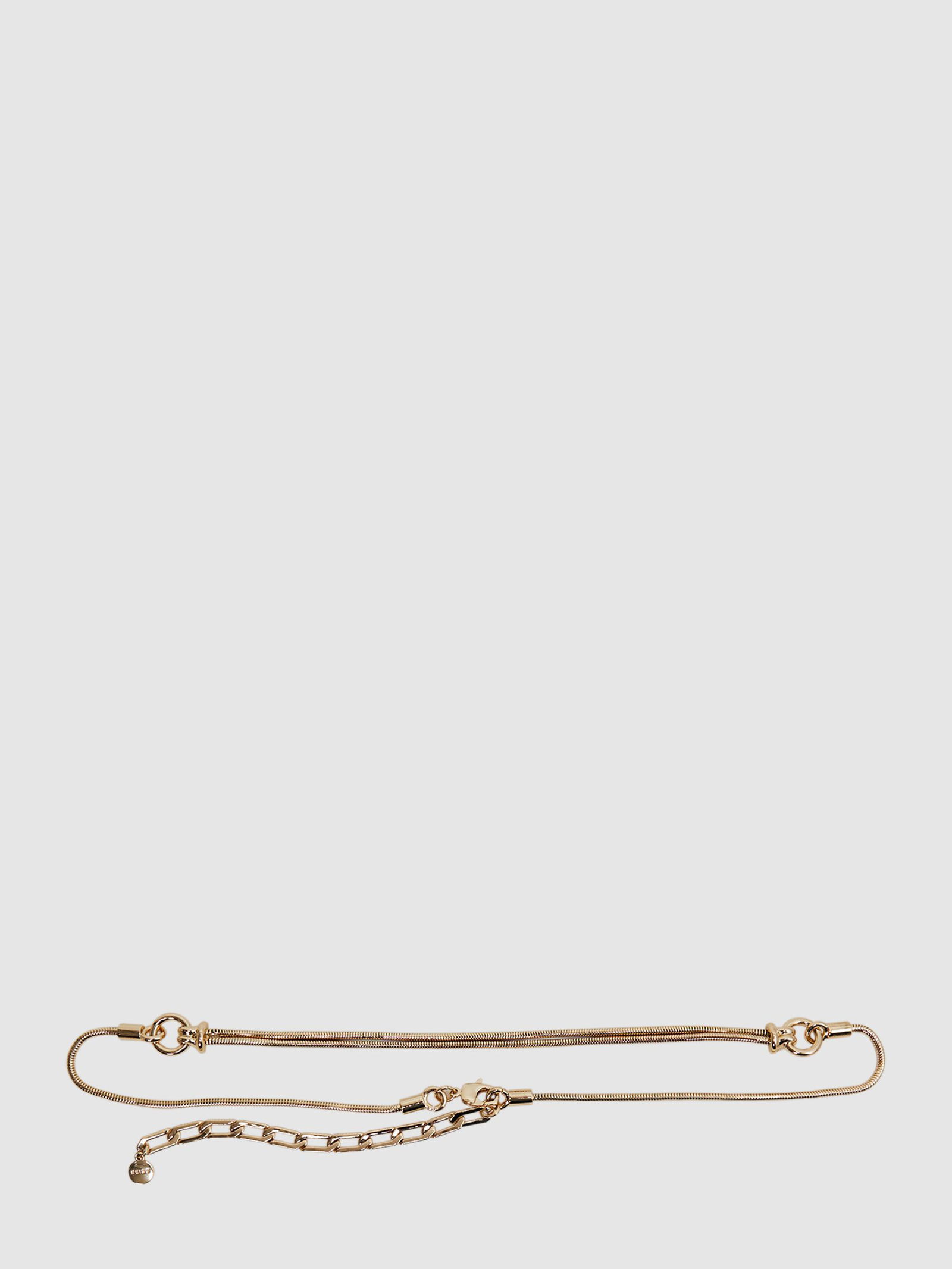 REISS Isobel Adjustable Snake Chain Belt in Gold | endource