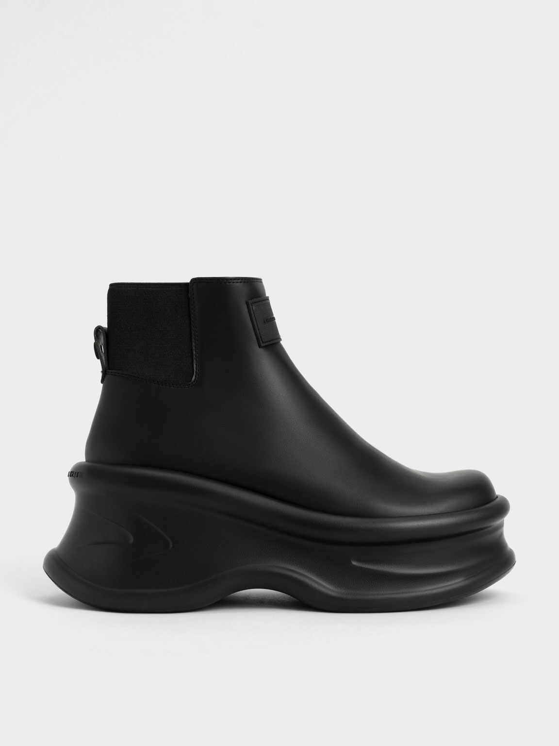 CHARLES & KEITH Curved Platform Ankle Boots in Black | Endource