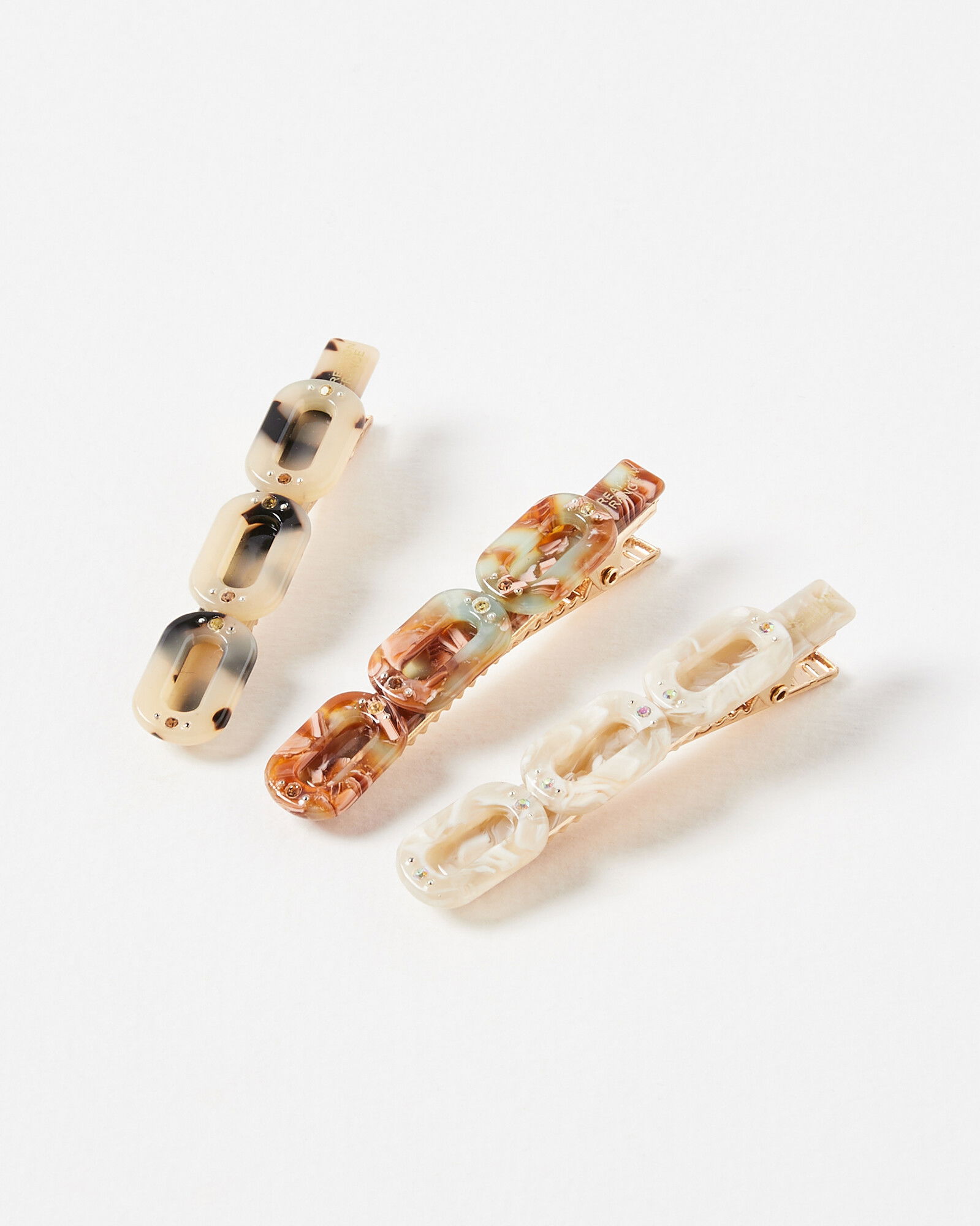 OLIVER BONAS Nova Rectangular Oval Hair Clips Set Of Three in Multi ...