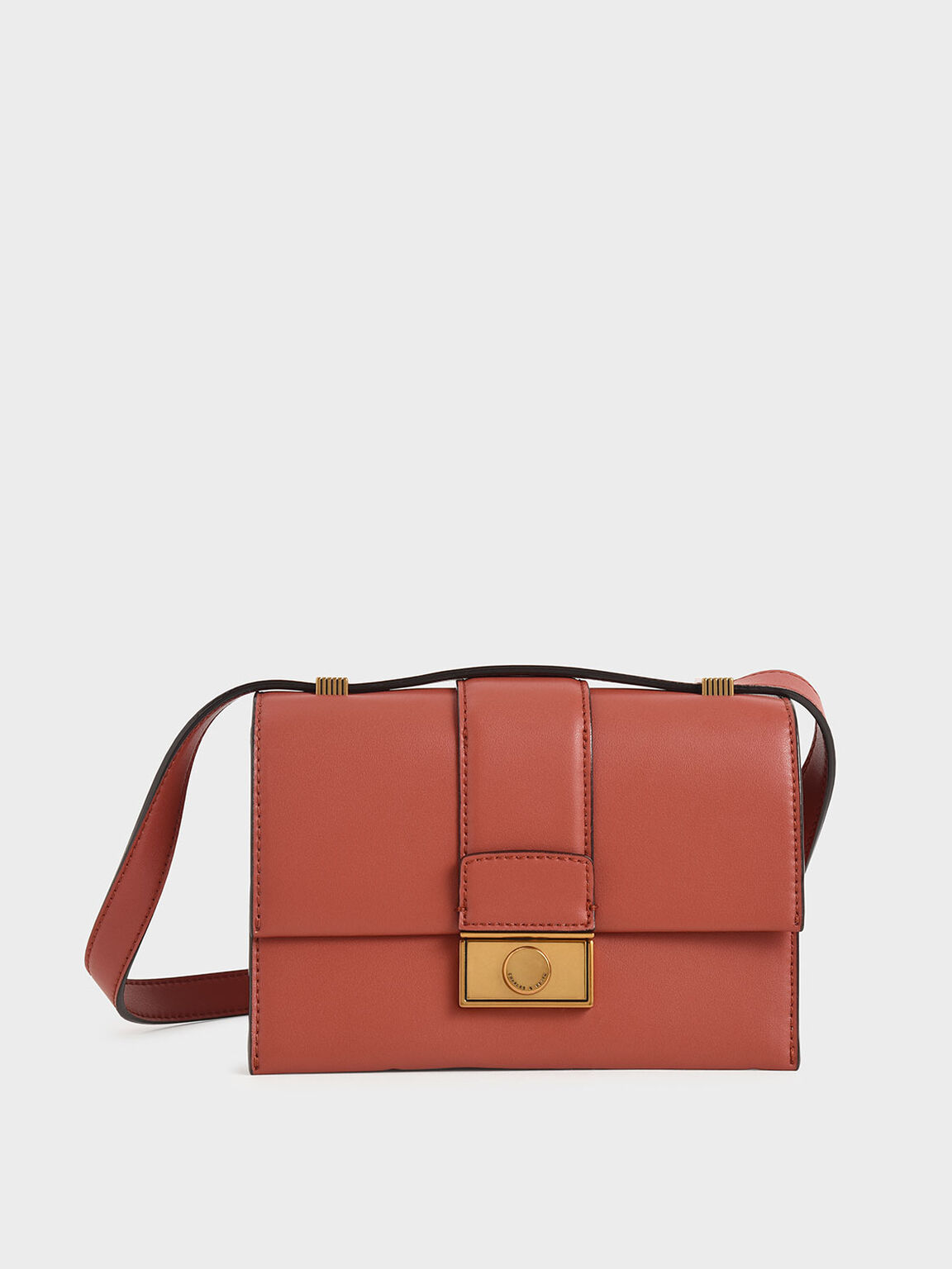 CHARLES & KEITH Metallic Push-Lock Crossbody Bag in Clay | endource