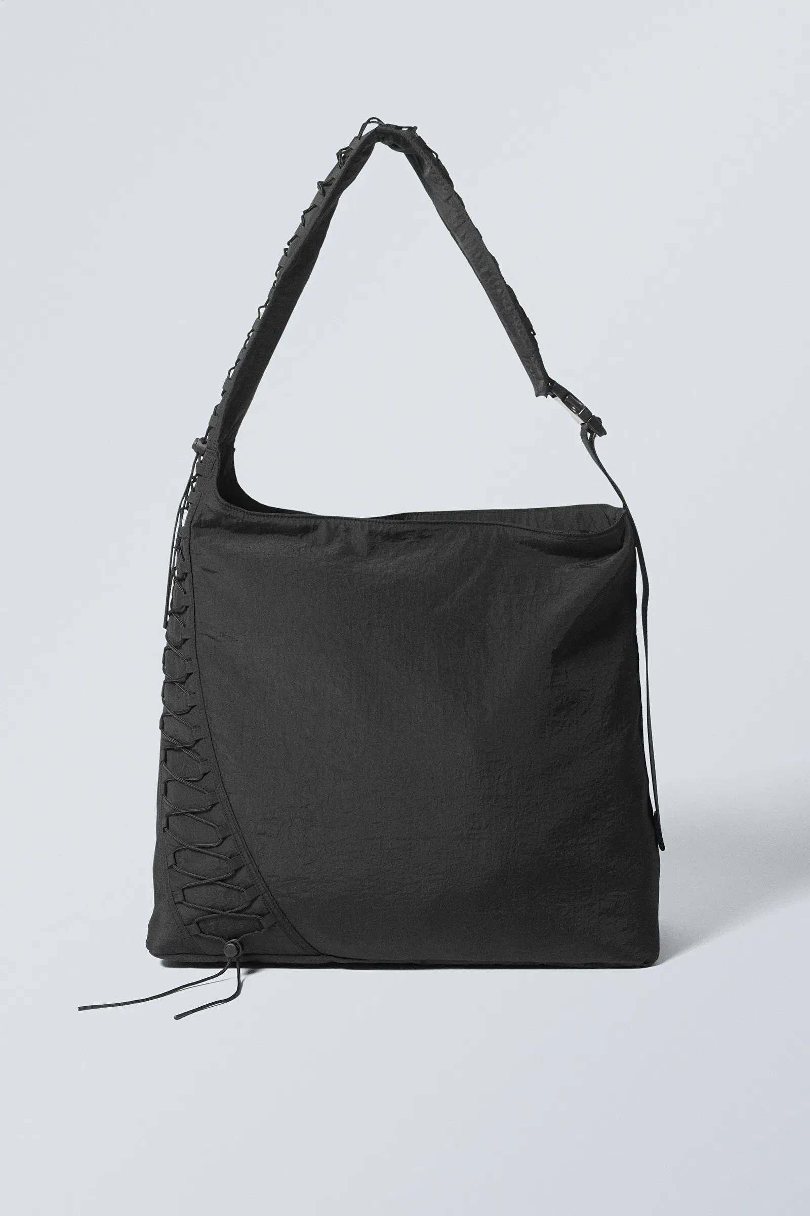 WEEKDAY Dawa Drawstring Shoulder Bag in Black | endource