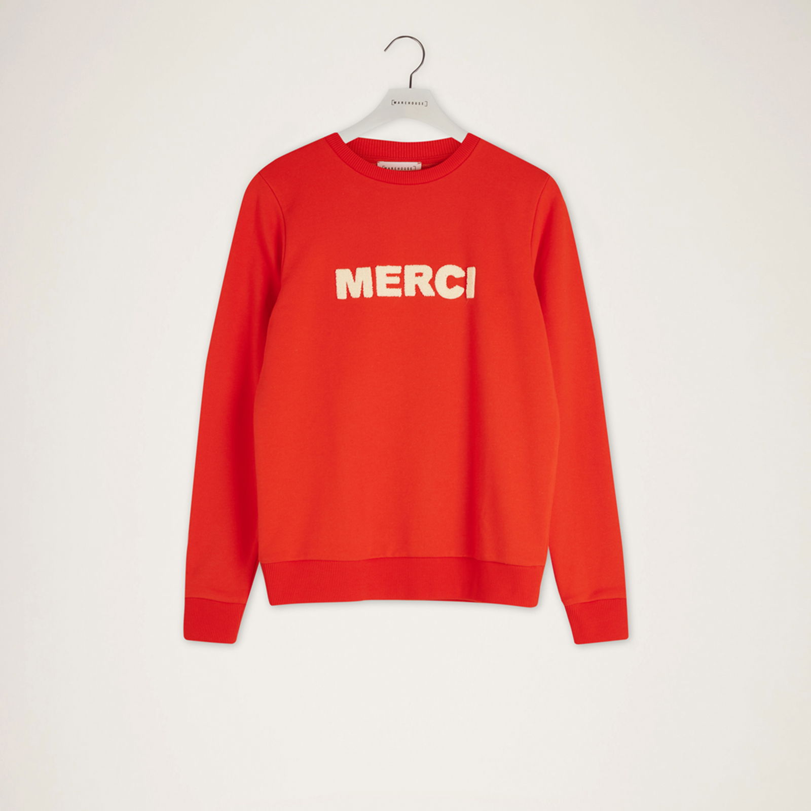 WAREHOUSE Merci Slogan Sweatshirt in Orange | endource