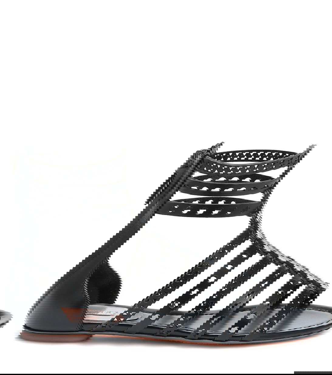 Alaïa Laser-Cut Leather Sandals in Black | endource