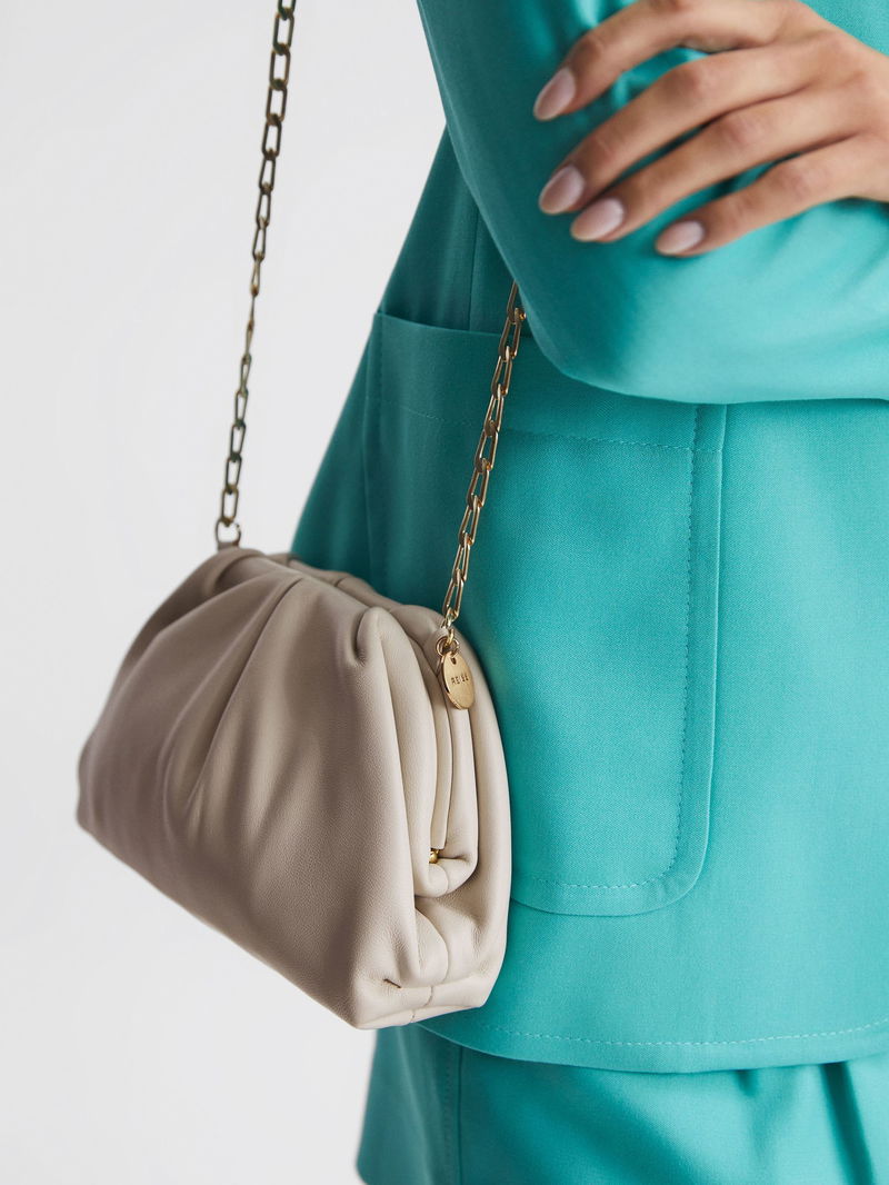 REISS Elsa Nappa Leather Clutch Bag in Off White | endource