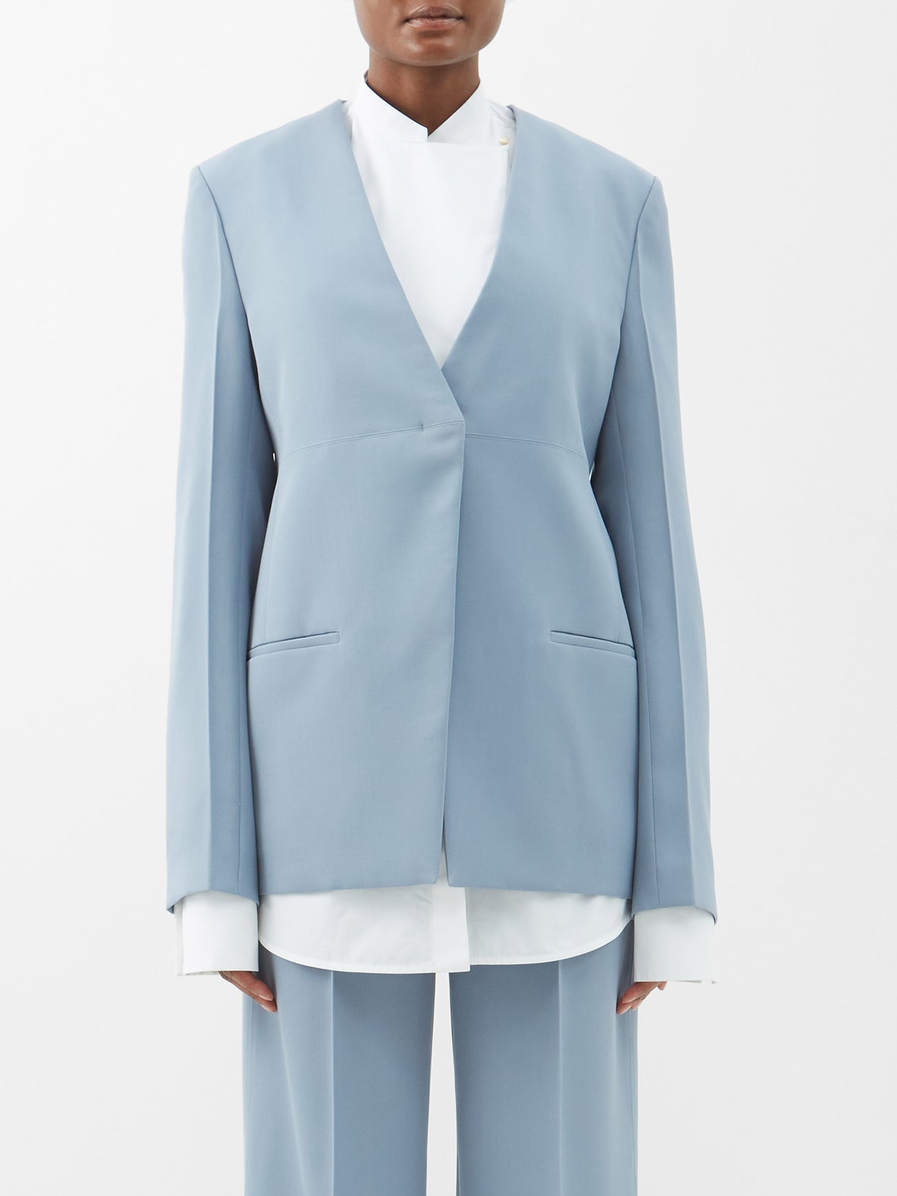 JIL SANDER Collarless Panelled Wool Jacket in Blue | endource