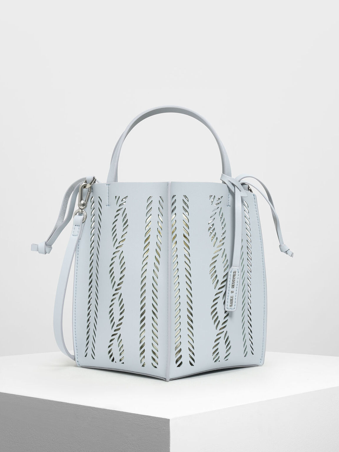 CHARLES & KEITH Laser-Cut Bucket Bag | endource