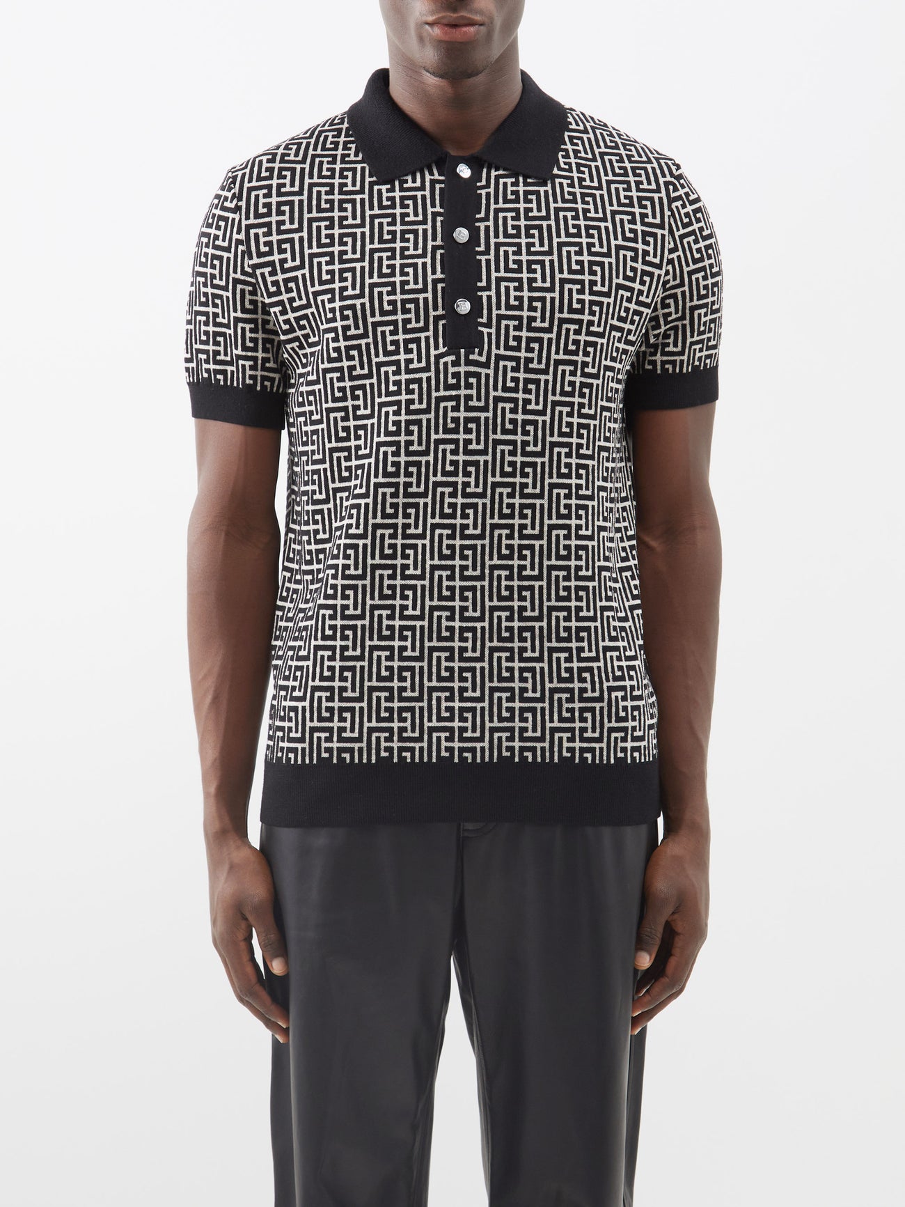 BALMAIN Monogram-Jacquard Merino-Blend Polo Shirt in Black | endource