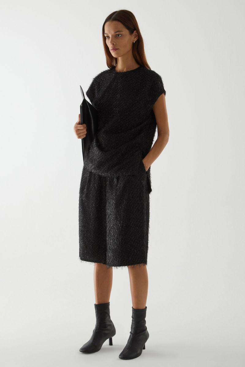 COS Tailored Feathered Shorts in black | Endource