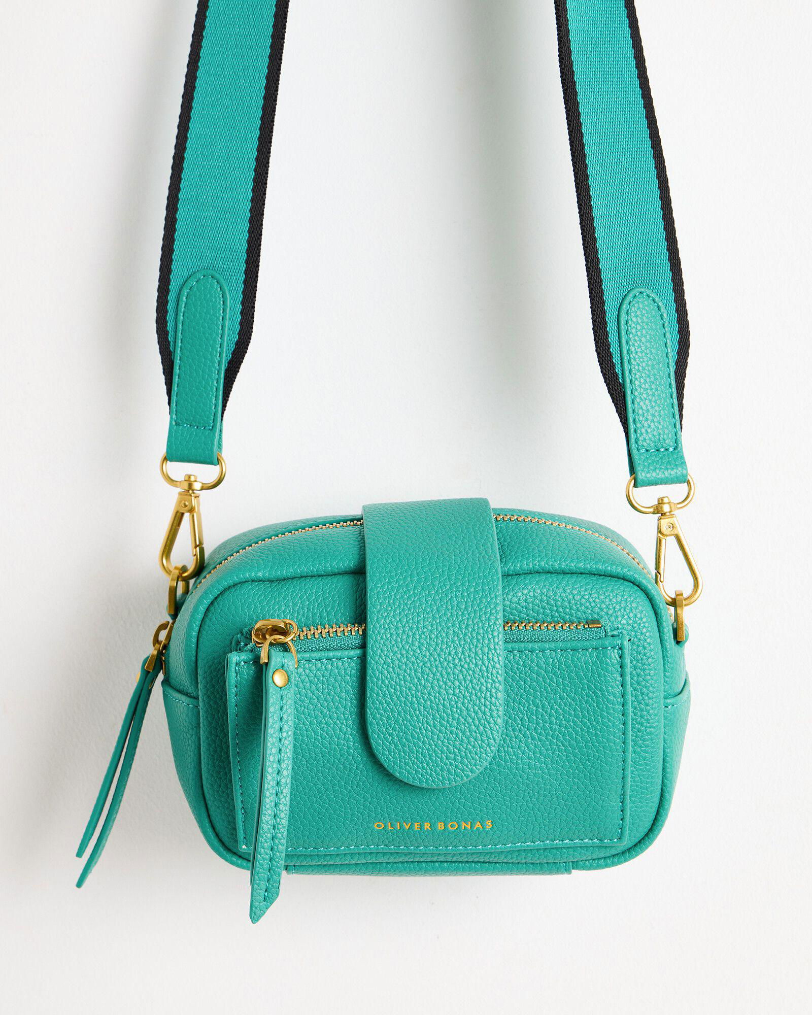 OLIVER BONAS Cora Peacock Crossbody Bag in Green | endource