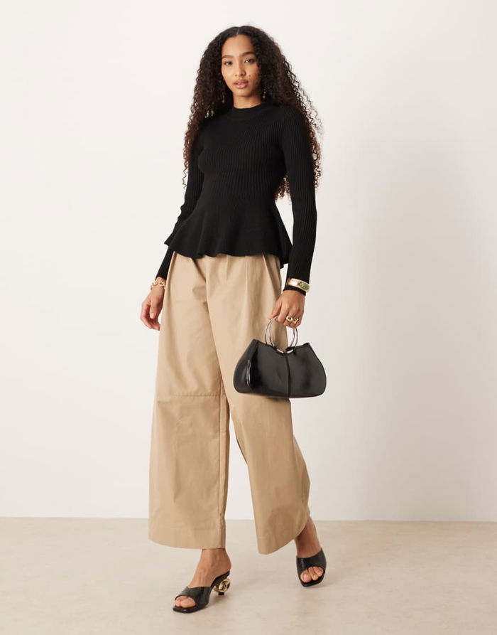 MANGO Ribbed Knitted Top With Peplum Hem In Black | endource