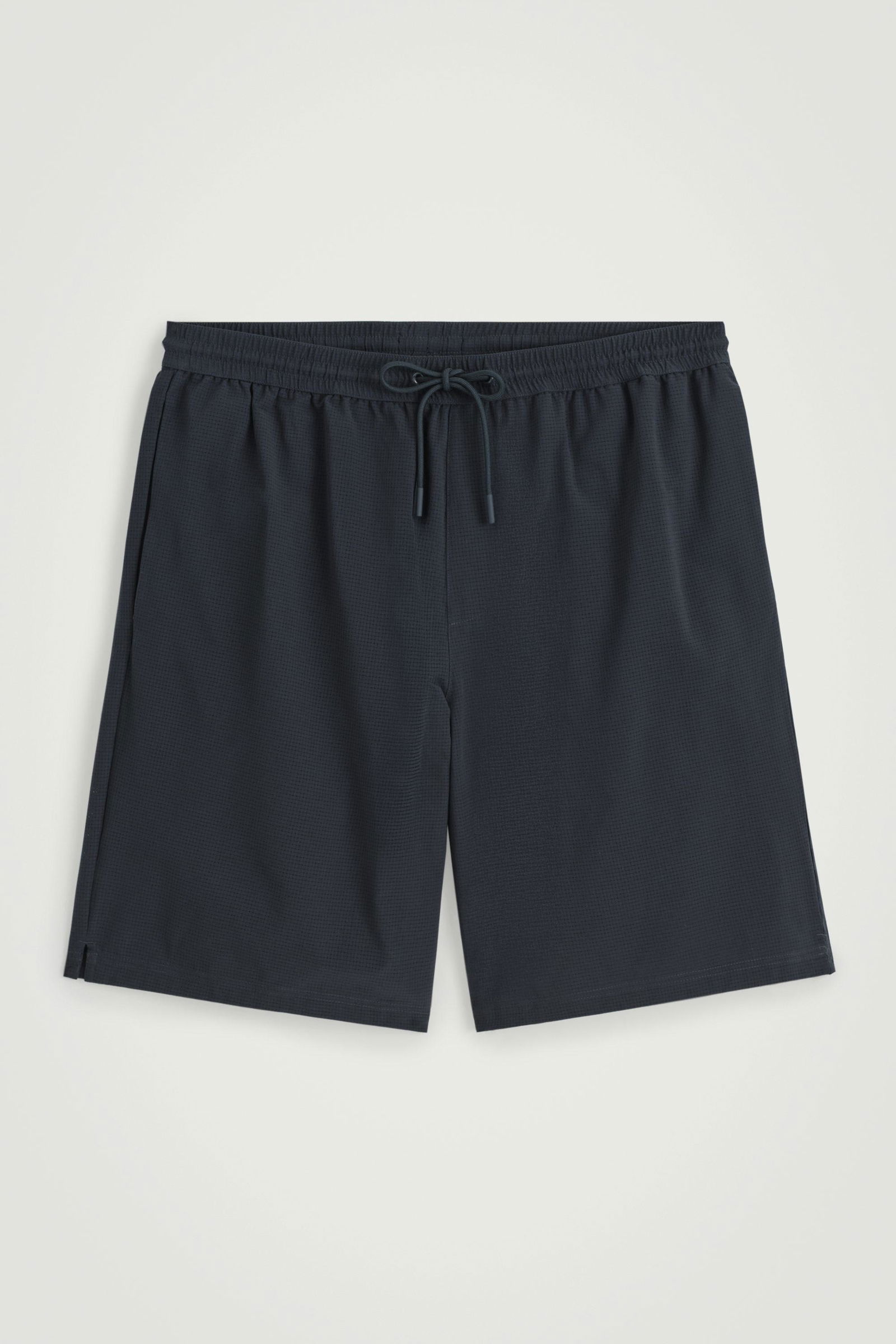 COS Perforated Swim Board Shorts in NAVY | endource