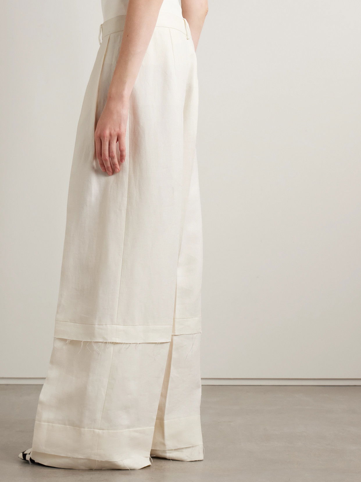 KHAITE Linden Tiered Frayed Linen Pants | endource