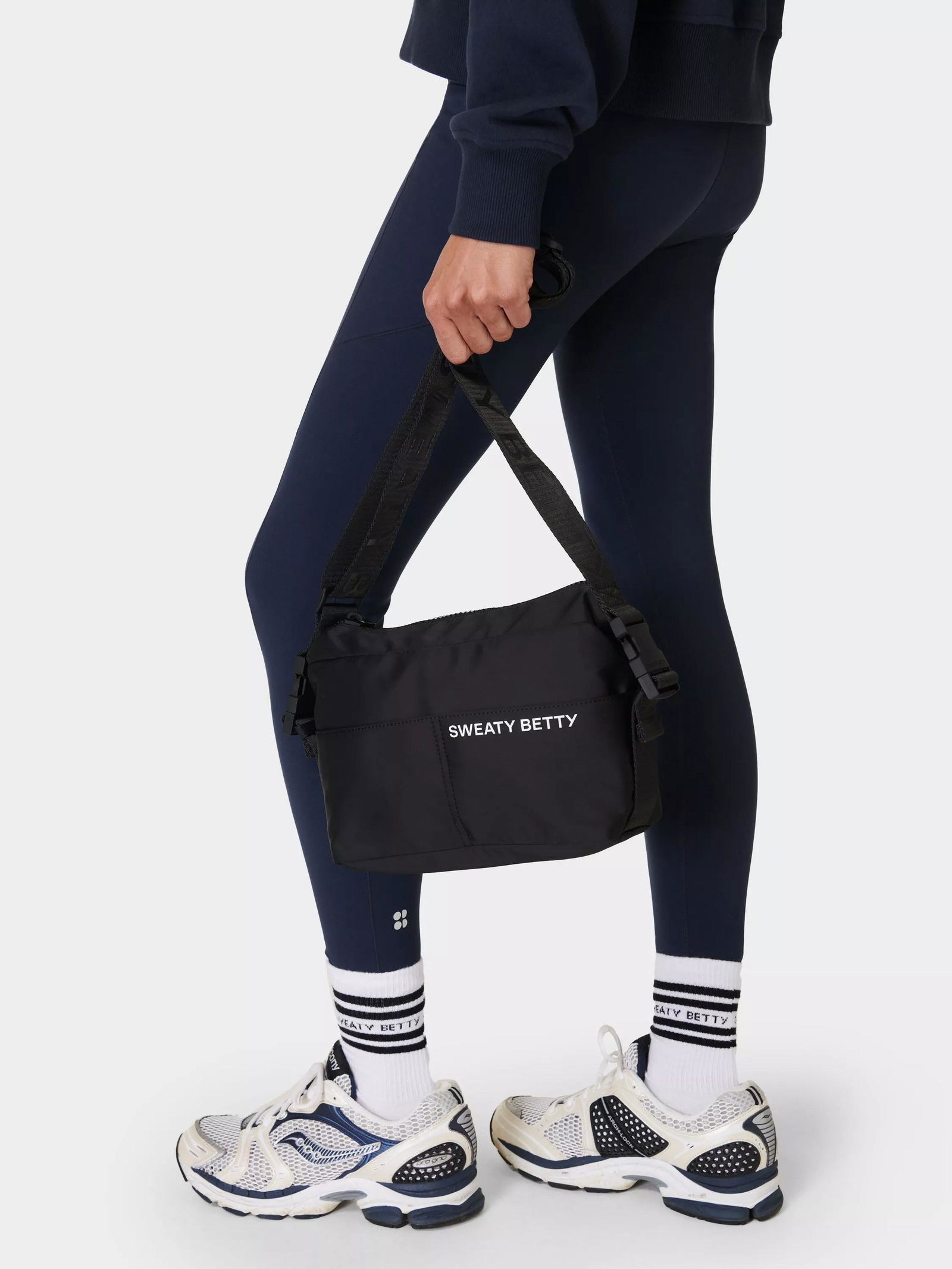 SWEATY BETTY Strive Crossbody Bag in Black | endource