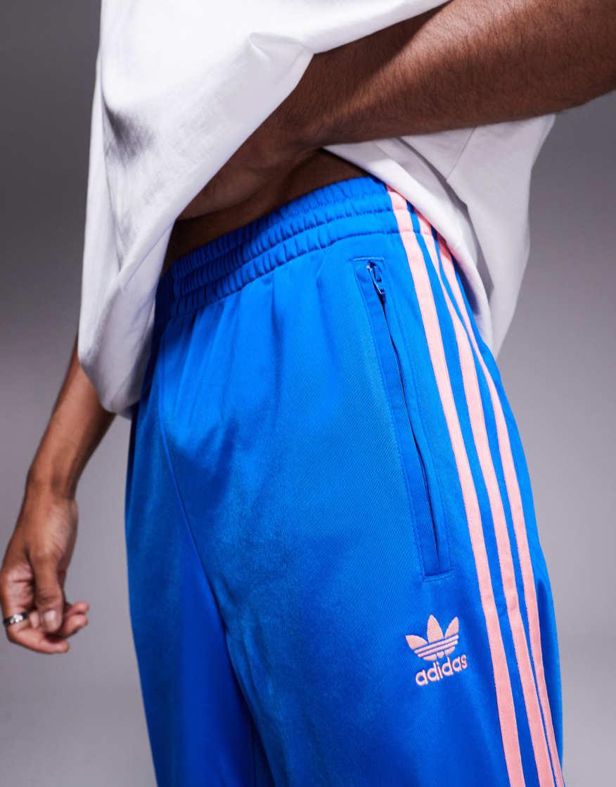 ADIDAS ORIGINALS Firebird Track Pants In Blue | endource