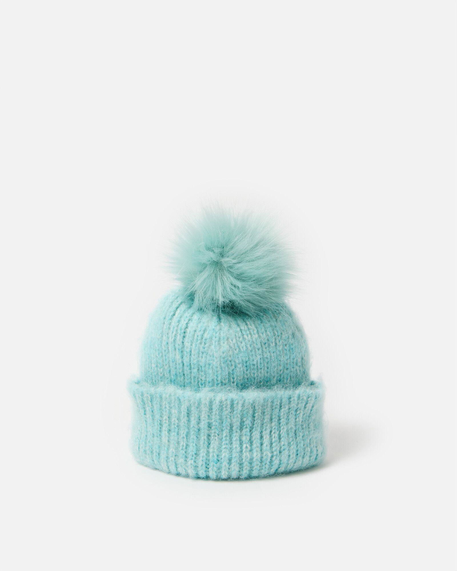 OLIVER BONAS Fluffy Pom Pom Bobble Hat in Blue | endource
