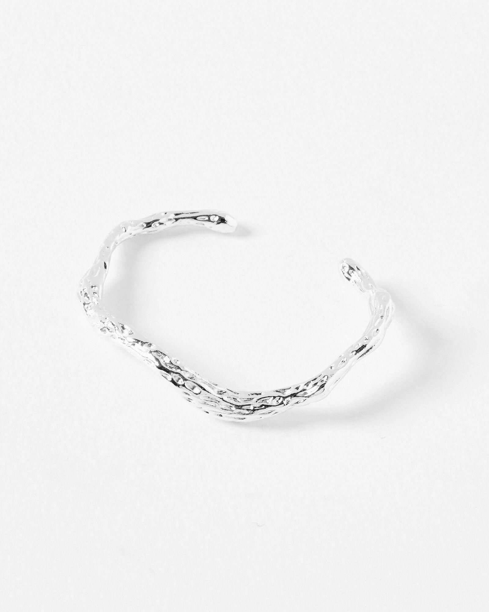 OLIVER BONAS Emira Molten Silver Tone Textured Bangle in Silver | endource