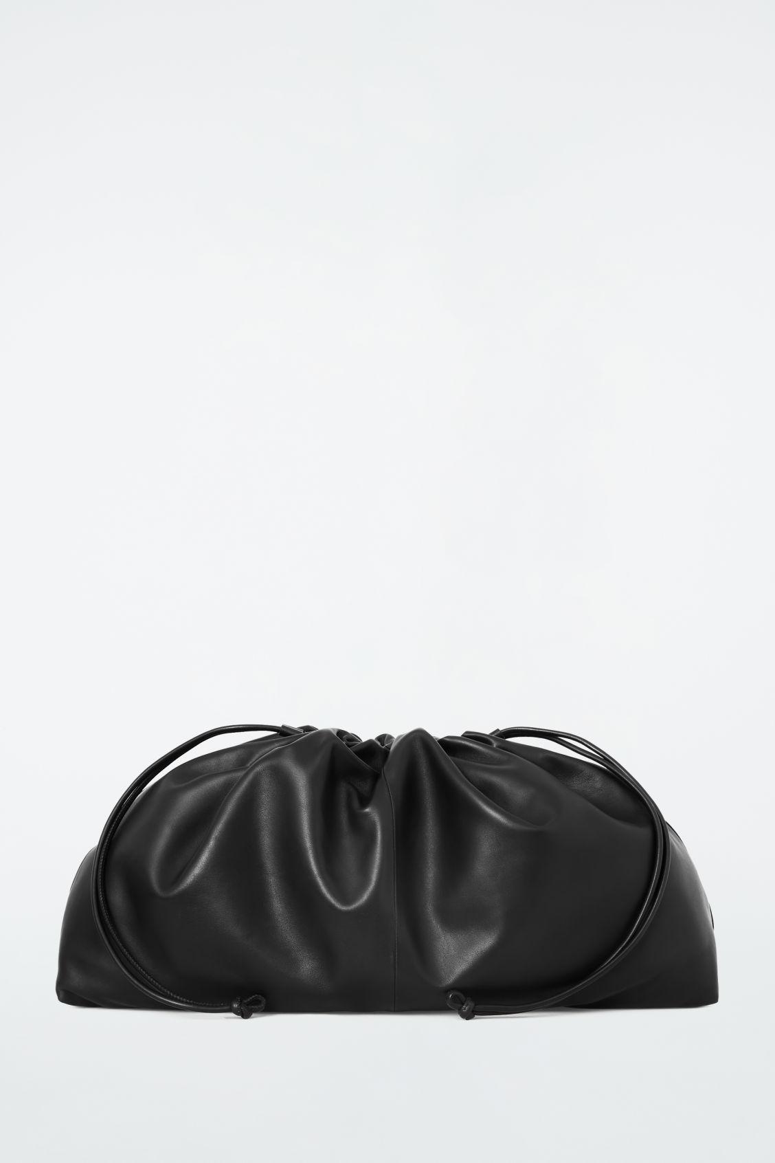 COS Cavatelli Oversized Leather Clutch in BLACK | Endource