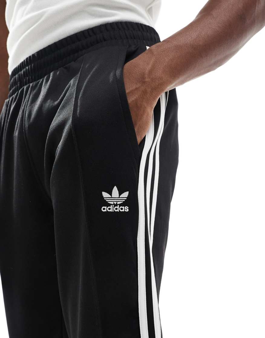 ADIDAS ORIGINALS Adicolour Flare Tracksuit Bottoms In Black | endource