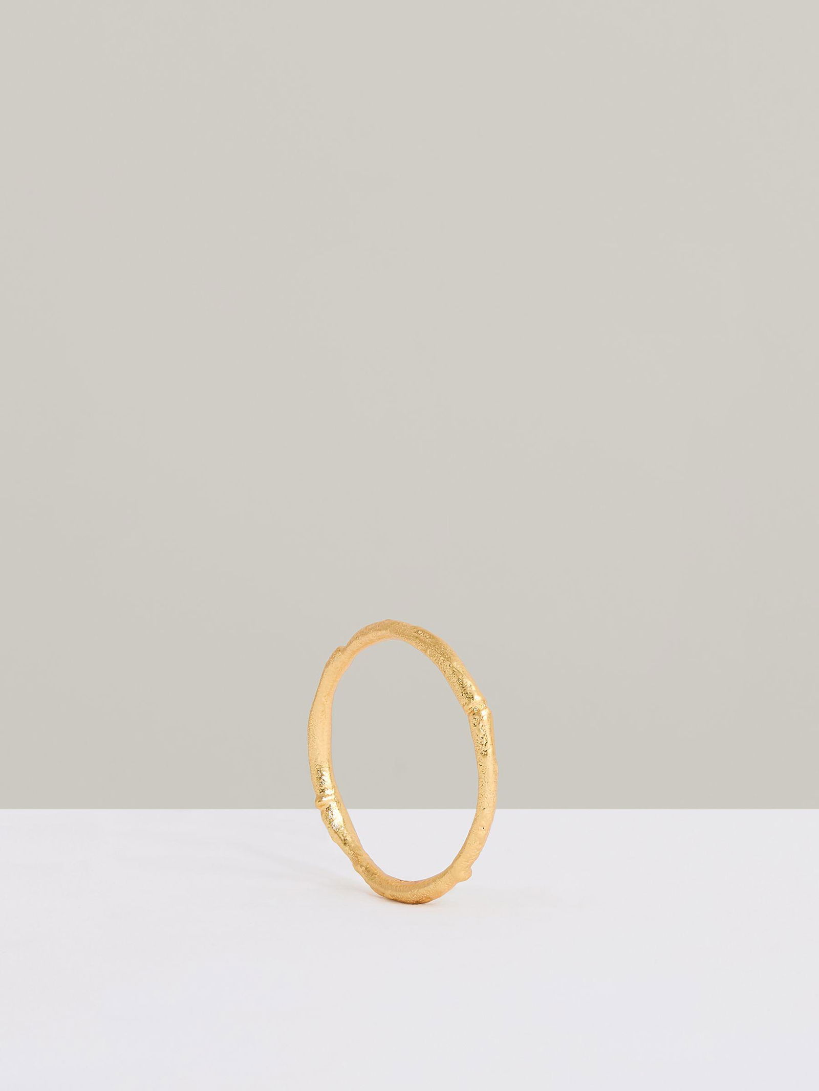 REISS Molten Curve Bangle in Gold Tone | endource
