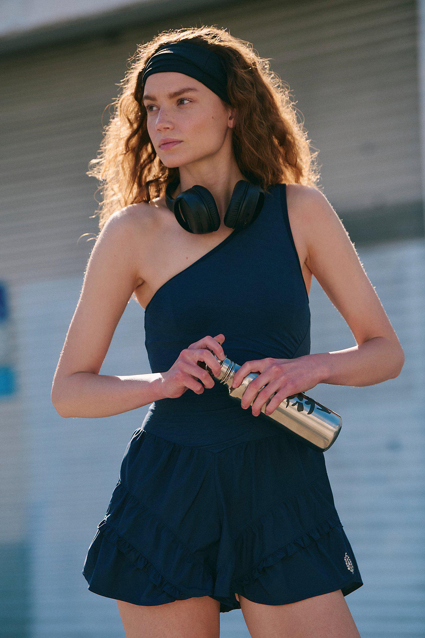 FREE PEOPLE FP Movement - Show Out Romper in Pastel Peach | endource