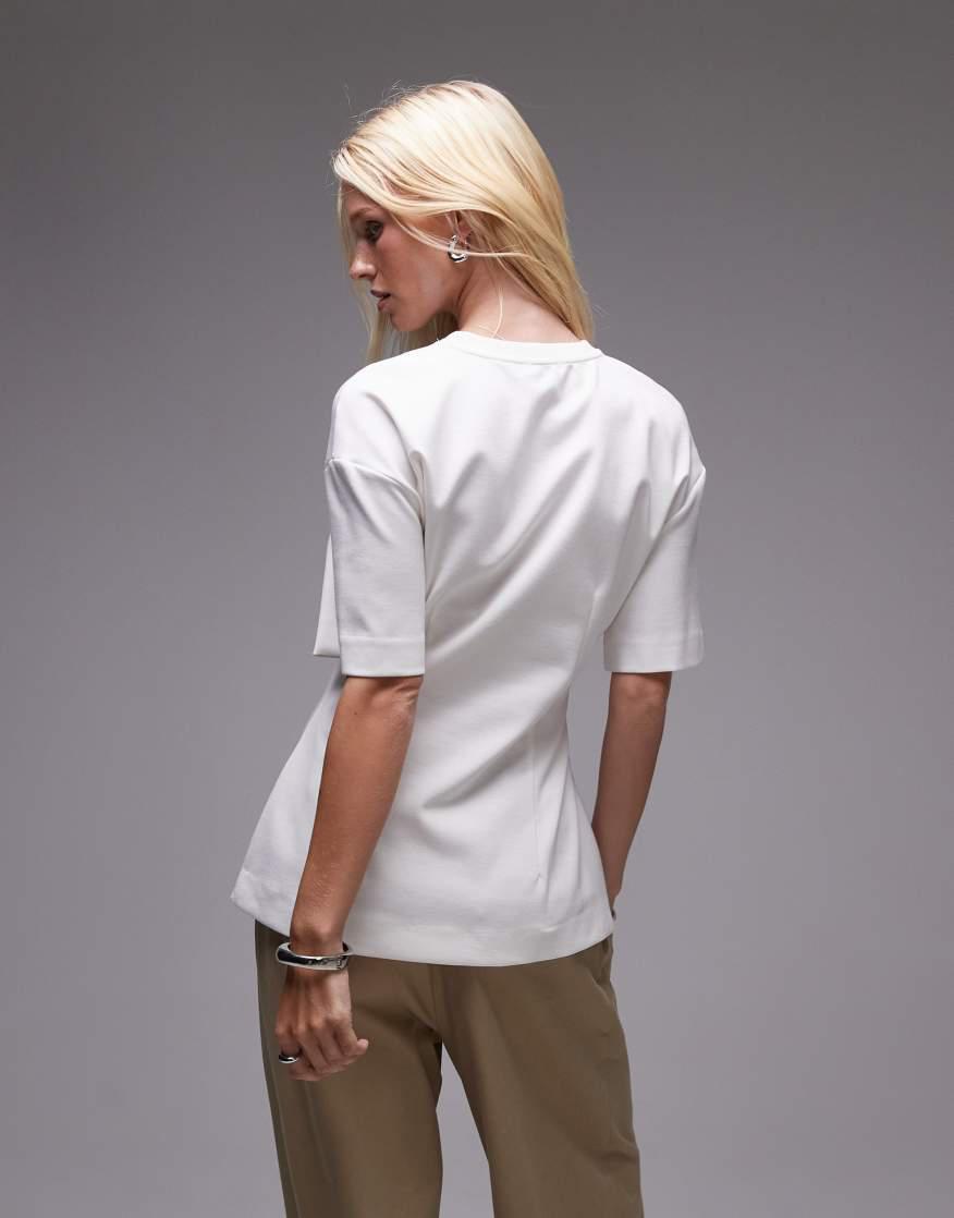 MANGO Capsule Structured Peplum Top In White | endource