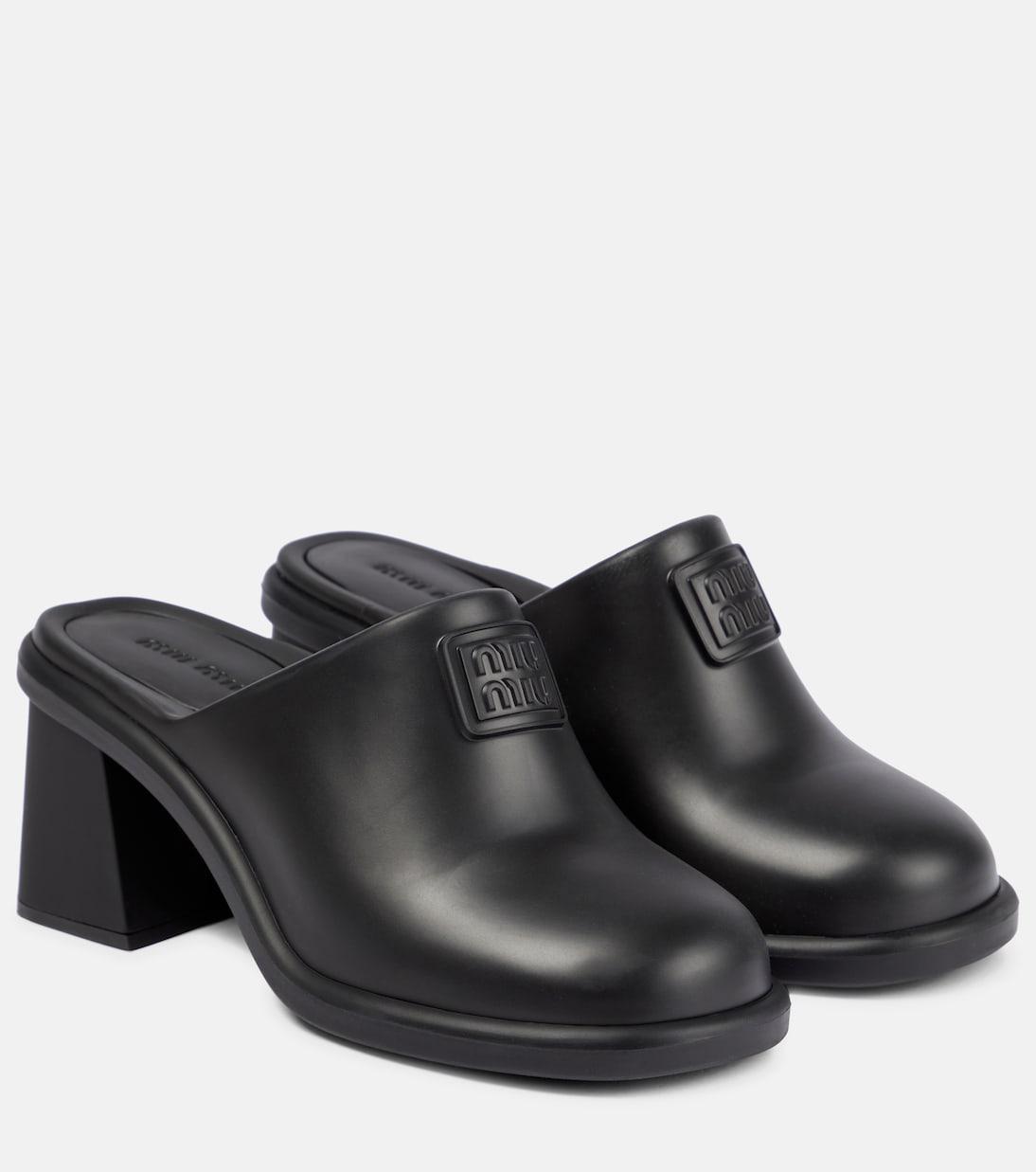 MIU MIU Logo Rubber Clogs in Black | endource