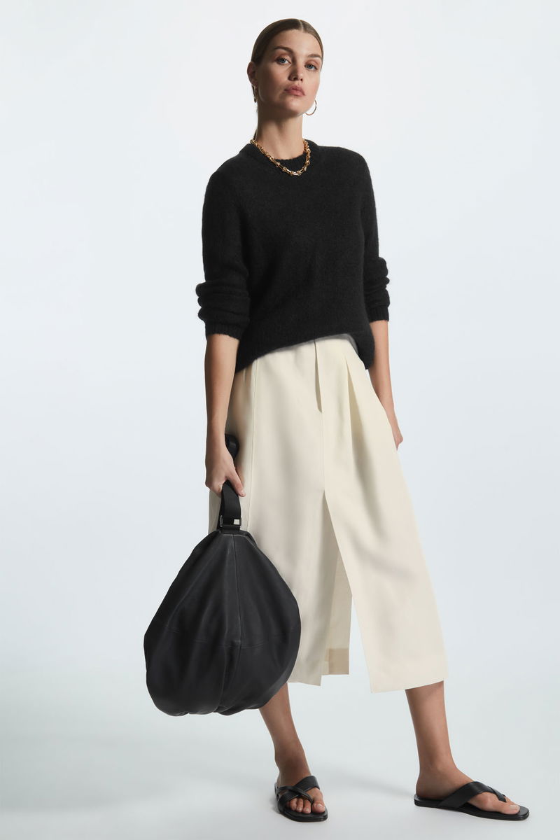 COS Leather Sling Backpack in BLACK | endource