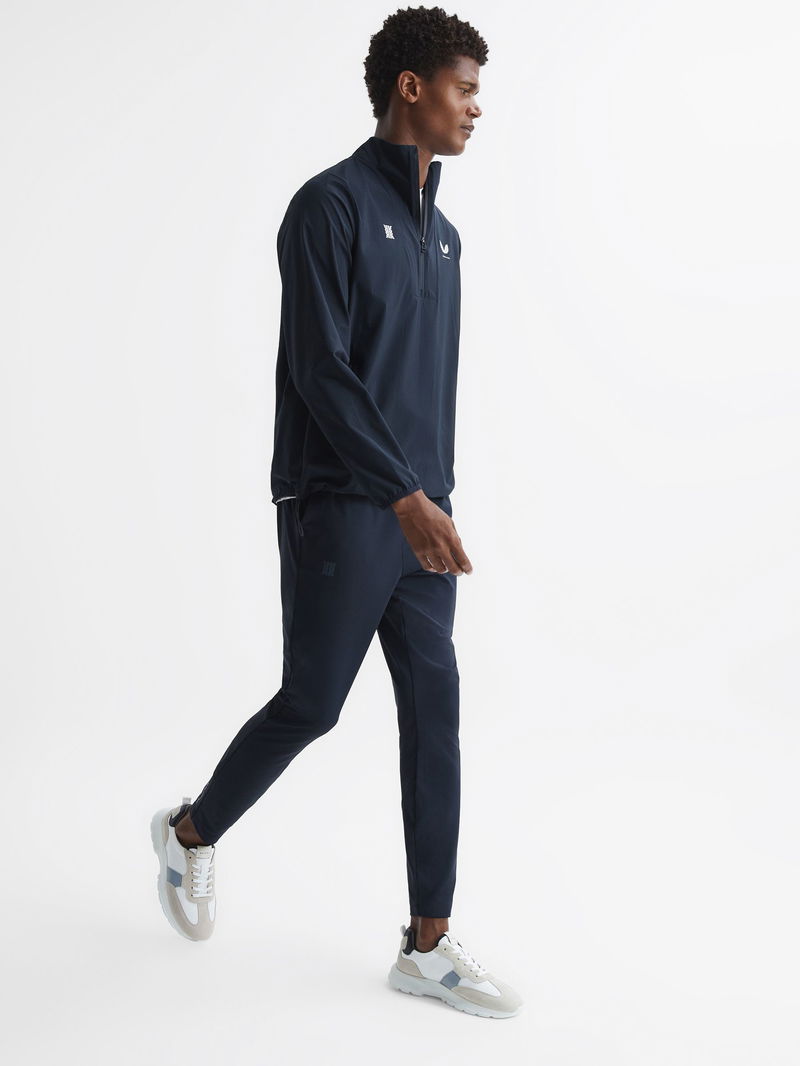 REISS Reiss x Castore - Noah Hybrid Performance Trousers in Blue | endource